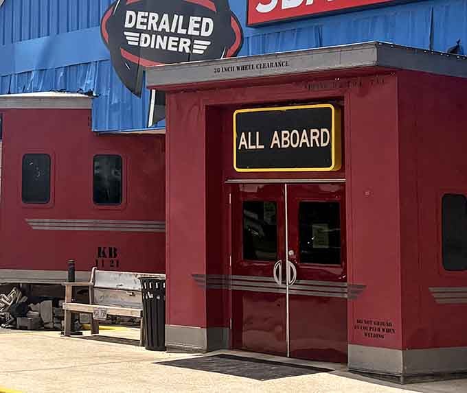The "All Aboard" entrance says it all. Step through those red doors and leave your ordinary lunch plans behind.