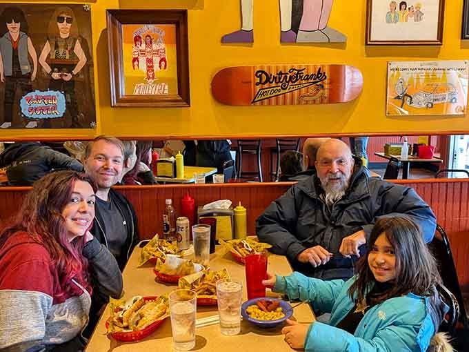 Four happy diners surrounded by great food and even better wall art, this is what dining out should feel like.