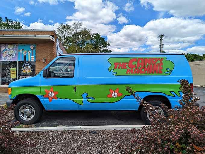 The Candy Machine van parked outside, wearing its colorful wrap like a rolling invitation you simply cannot refuse.