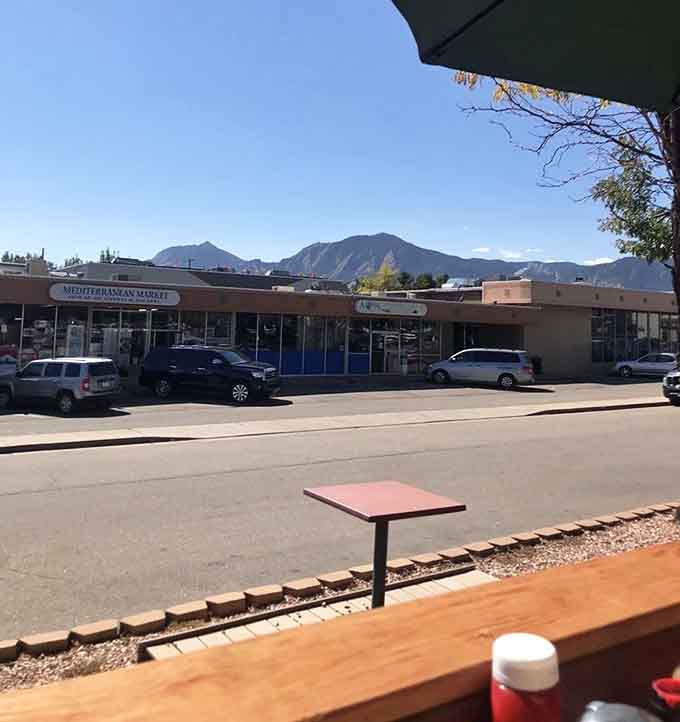 Step outside Dot's and the Flatirons are right there watching you finish your coffee. Not a bad view.