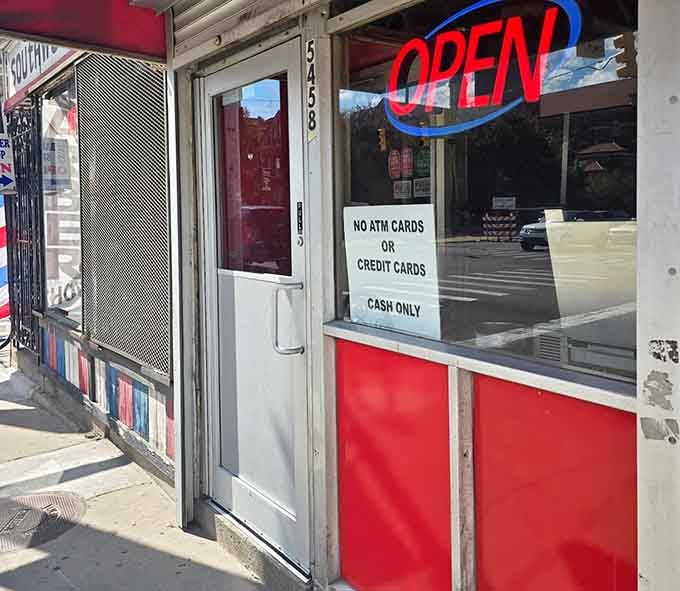 That "Open" sign in the window says it all, and the "Cash Only" notice below it keeps things refreshingly old-school.
