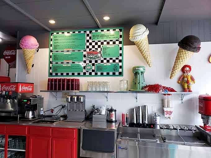Behind this counter, milkshakes are made the old-fashioned way, with real care and a proper steel mixing cup.