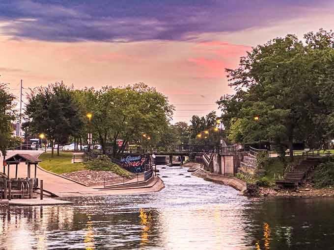 Golden hour over the East Race waterway, where South Bend glows like it knows exactly how good it has it.