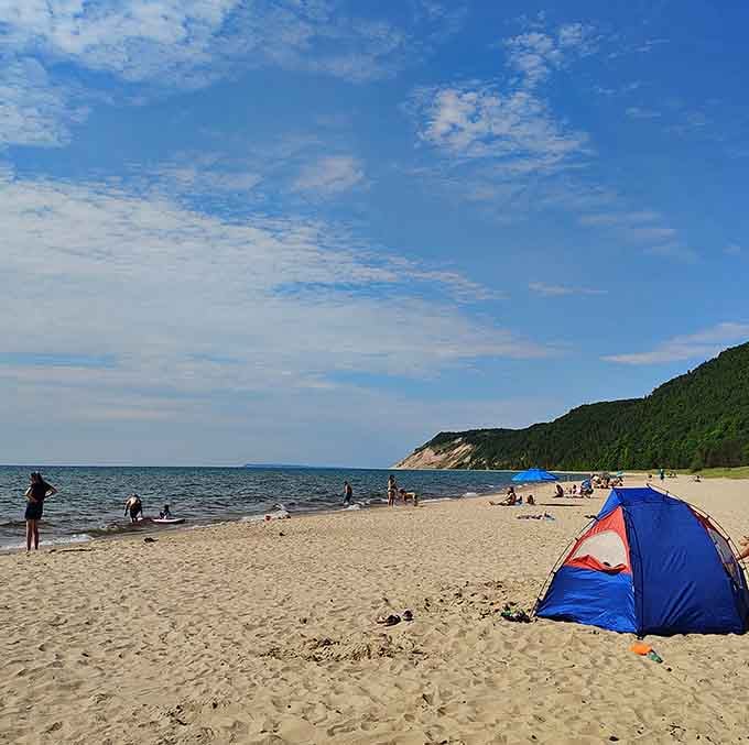Tent pitched, bluffs in the background, and Lake Michigan right there. Someone planned this trip perfectly.