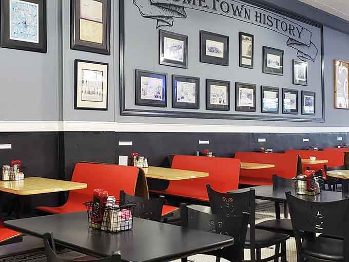 Framed photos and old documents line the wall under a sign that reads "Hometown History." Lunch and a history lesson, all in one visit.