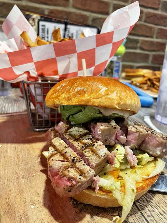 Those gorgeous grill marks on the tuna and a brioche bun golden enough to make a baker jealous say it all.