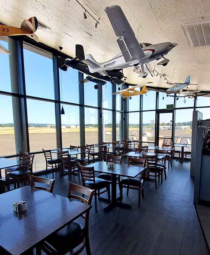 The dining room balances aviation charm with comfortable practicality, making it perfect for any occasion or celebration gathering.
