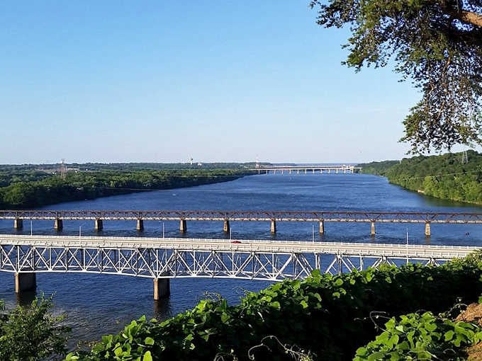 The Tennessee River stretching wide and blue through Florence, proof that some of nature's best work happens in Alabama.