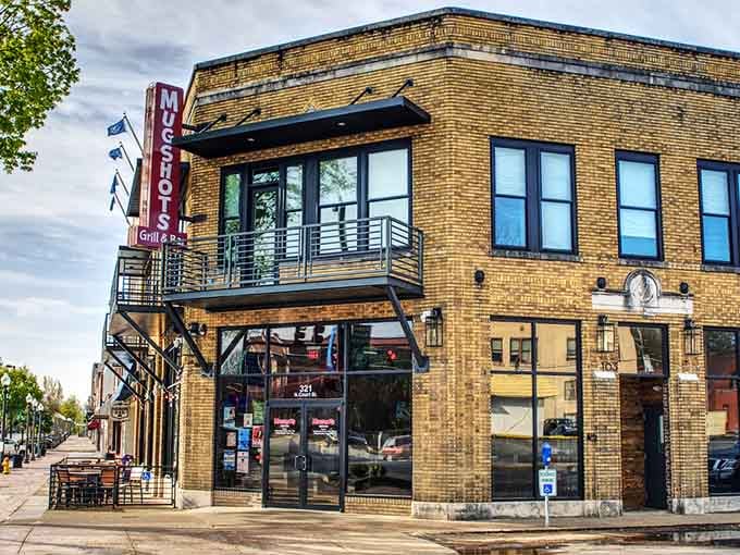 Mugshots Grill and Bar occupies a prime downtown corner spot, with a rooftop balcony that practically begs you to linger.