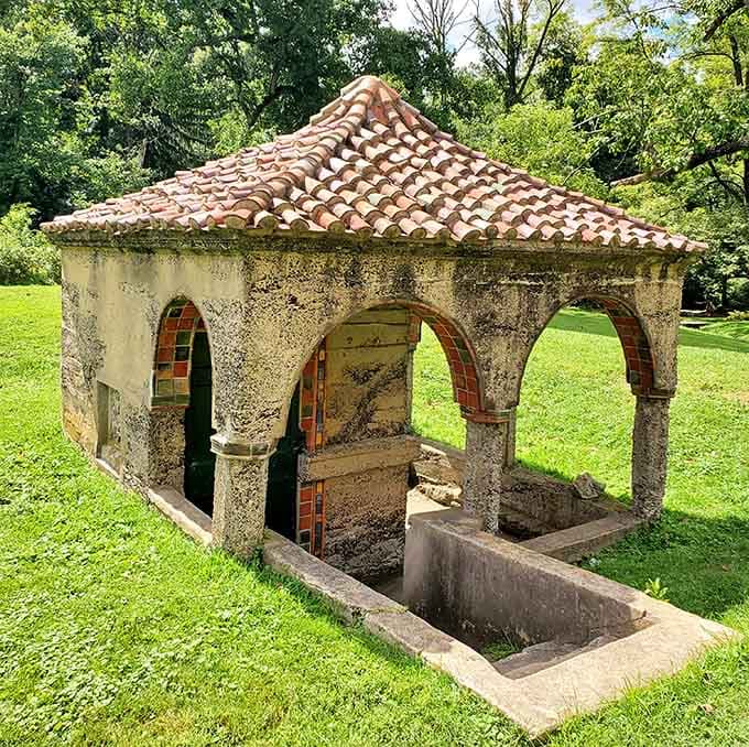 Even the garden structures got the full Mercer treatment, complete with terracotta roof tiles and arches.