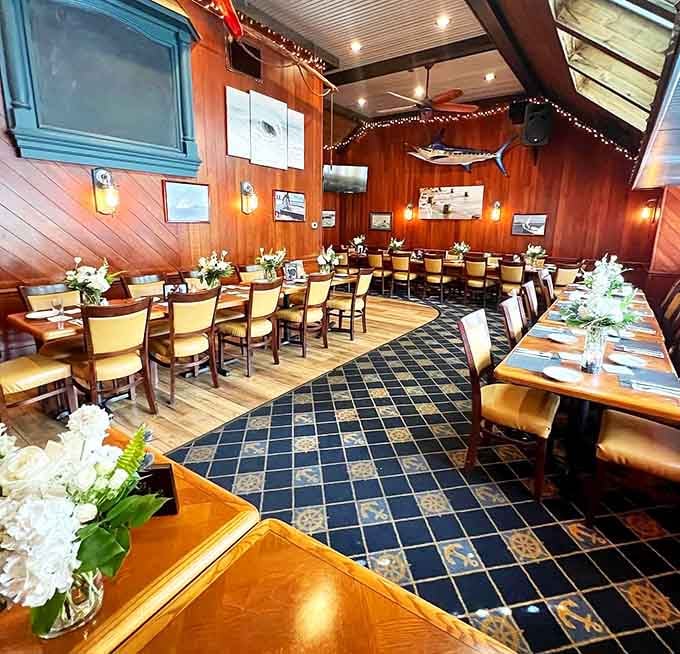 The main dining room dressed up for a special occasion, warm wood and nautical touches making it feel genuinely festive.