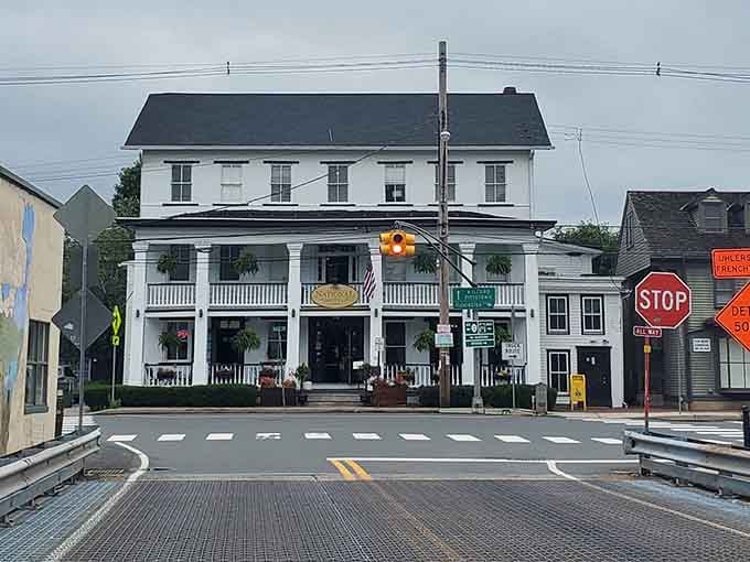 The National Hotel anchors the corner like it's been holding the whole town together, which it basically has.