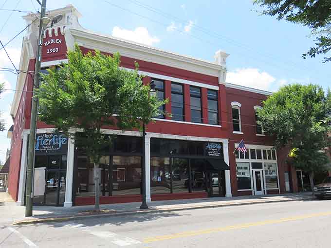 The Nadler Building, dated 1903 right at the roofline, wears its history openly while hosting fresh energy at street level today.