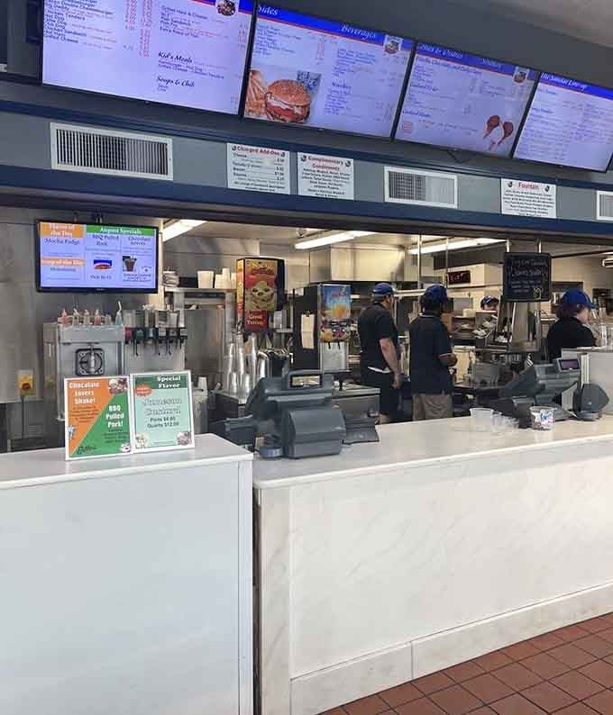 A busy counter, a focused crew, and the Flavor of the Day waiting patiently for its moment.