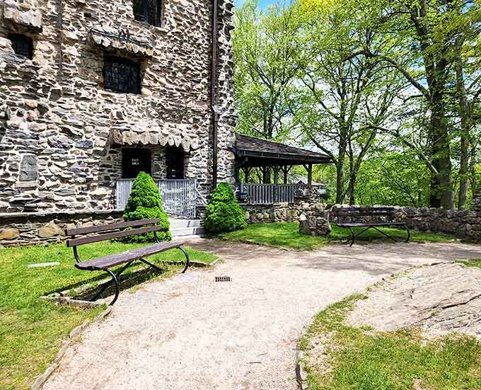 Quiet benches, fresh air, and a stone castle looming behind you. This is what a perfect afternoon actually looks like.