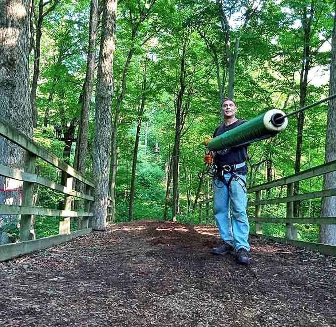 Even the staff carries equipment through the forest with the quiet confidence of someone who truly loves their job.