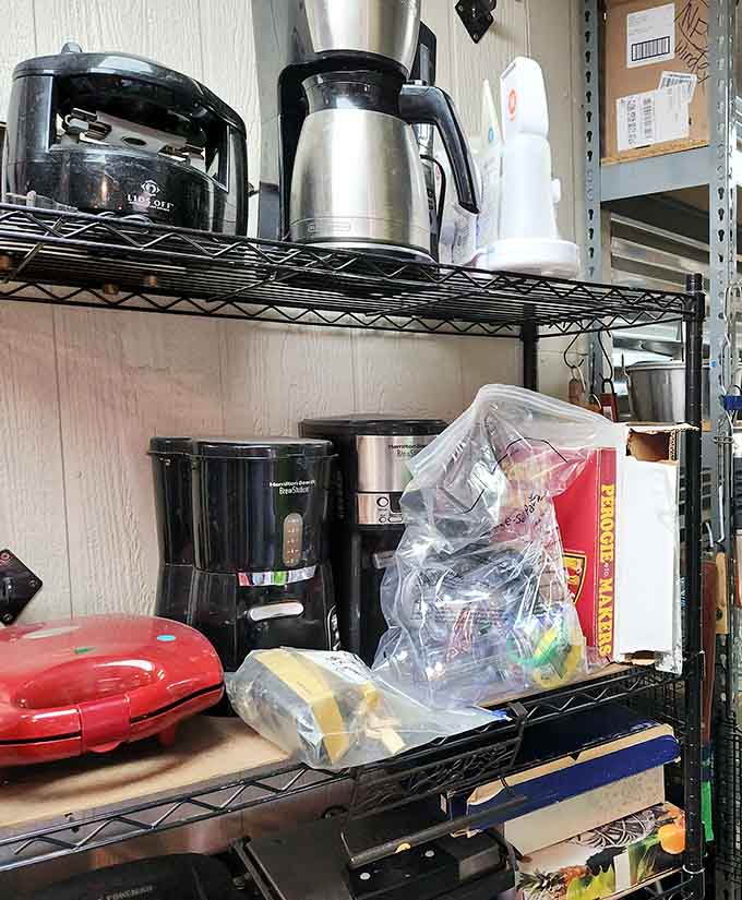 Coffee makers, kettles, and kitchen appliances sit waiting patiently, proof that someone's kitchen upgrade became your excellent opportunity.