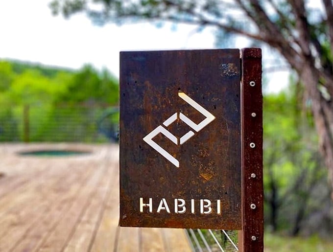 A weathered metal sign that simply says Habibi. Short, warm, and completely to the point, just like the experience itself.