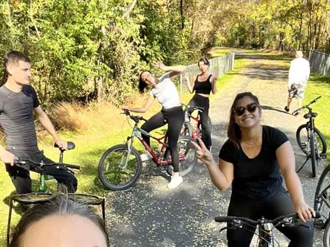 Group bike rides along the river prove that the best adventures are the ones you share with actual people.