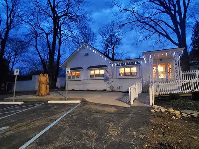 Even at dusk, Hollyhock Hill glows with the kind of warmth that makes you want to walk straight through the door.