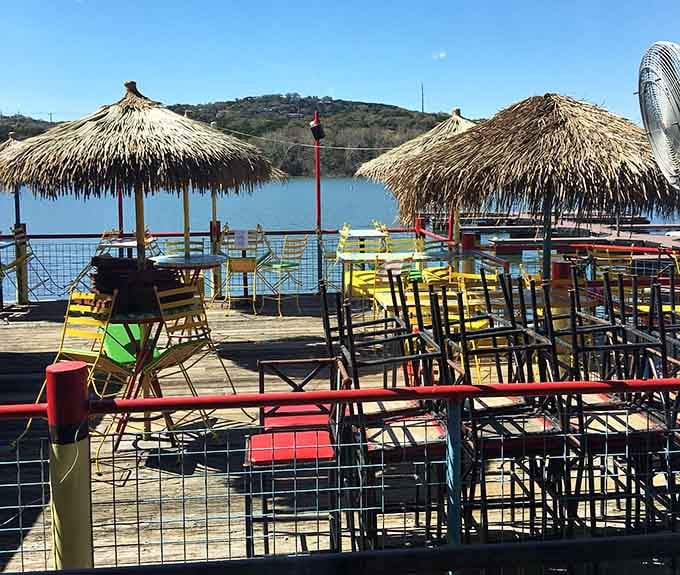 Colorful chairs, thatched umbrellas, and open water stretching to the horizon, this is the deck you've been dreaming about.