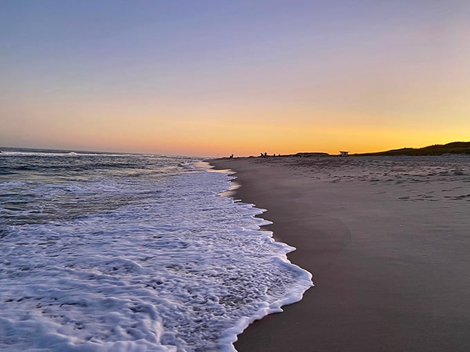 Golden hour transforms the beach into something from a postcard, except this view is genuinely real.