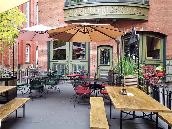 The Marion Hose Bar's outdoor patio, set inside a historic firehouse building, is where great afternoons are born.