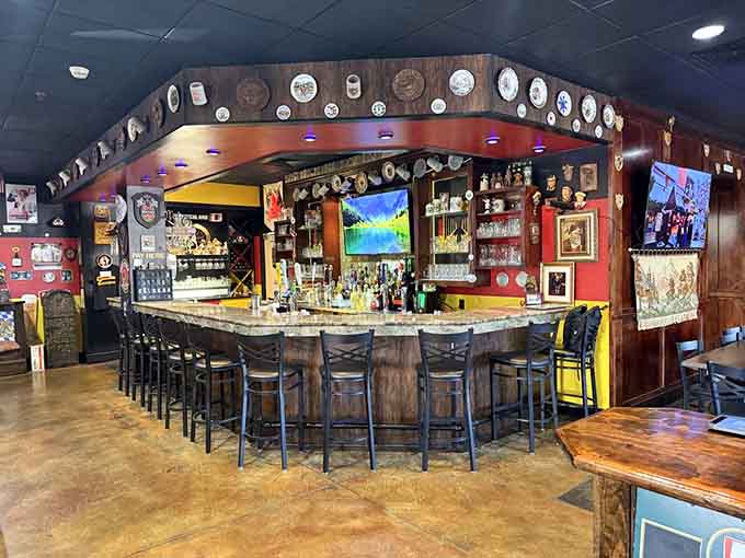A horseshoe bar lined with decorative plates and German steins, this is where the evening really begins.