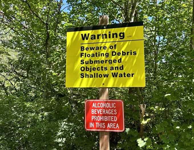 Warning signs near the river, a friendly reminder that the Green River is spectacular but also very much in charge here.