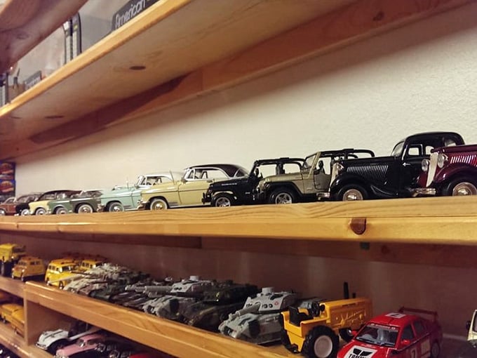 Classic toy cars parade across wooden shelves like a miniature Barrett-Jackson auction for the Hot Wheels generation.