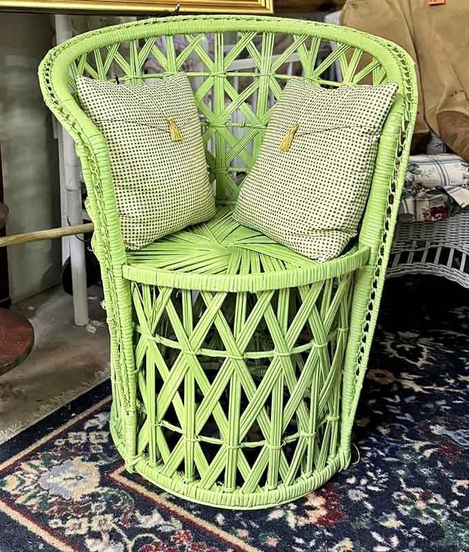 A lime green wicker barrel chair so bold and cheerful it practically introduces itself when you walk into the room.