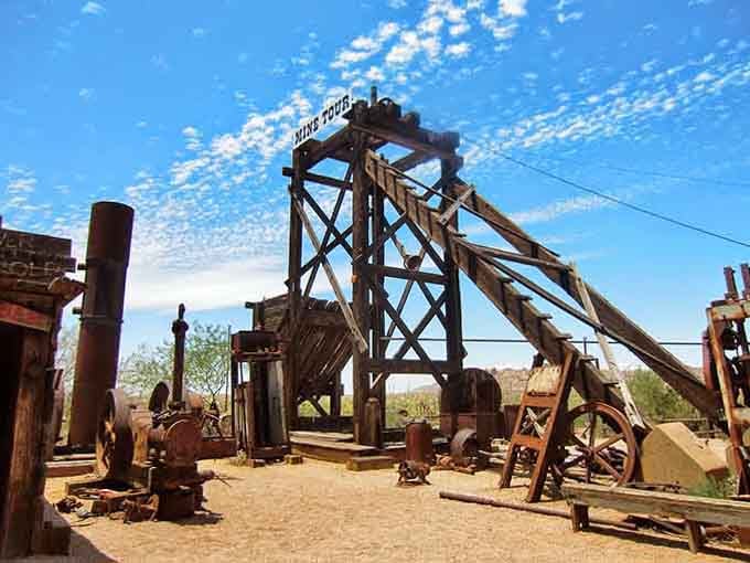 Rusted gears, weathered timber, and a mine tour sign that makes you genuinely curious about what's waiting underground.
