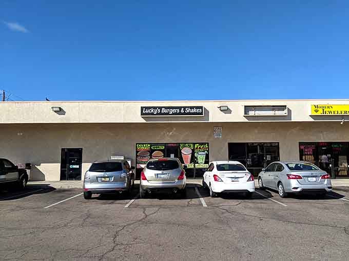 A humble strip mall exterior hiding one of Phoenix's most beloved burger spots. Never judge a book by its cover.