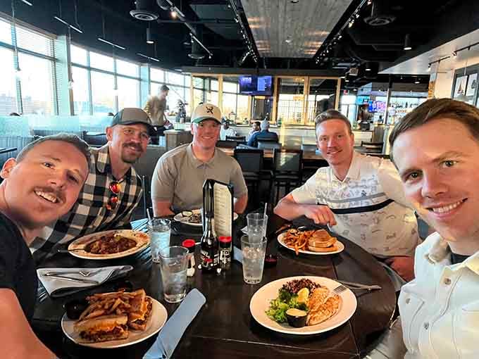 Five guys, five plates, and five enormous smiles, this is exactly what a great restaurant is supposed to look like.