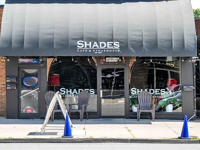 Shades Caf&eacute; and Steakhouse has the kind of sleek, dark awning that quietly promises a seriously good meal.