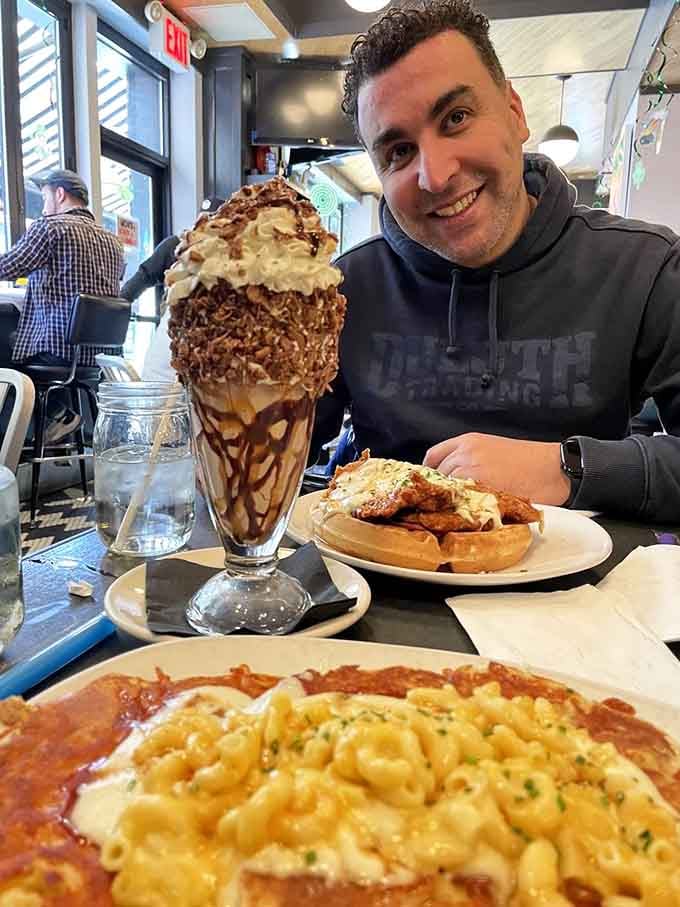 When the table looks like this, you stop talking and start eating. Mac and cheese pancakes, a chicken waffle, and a milkshake that means serious business.
