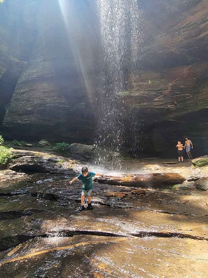 Standing behind the falls where the mist hits your face like nature's own spa treatment, no appointment necessary.