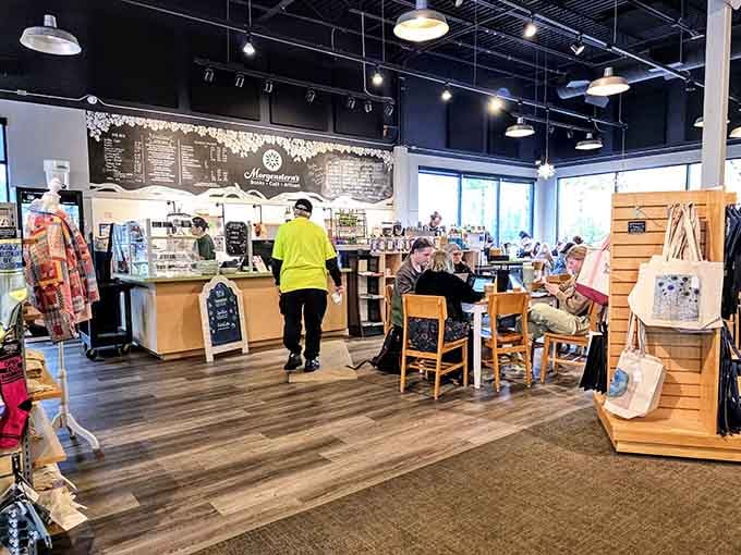 The café counter buzzing with activity, warm drinks being made, and people already settling in for the long haul. Smart choices all around.