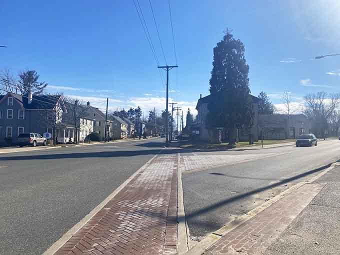 Brick-lined crosswalks and wide open roads give Mullica Hill's main intersection a small-town dignity that feels genuinely timeless.