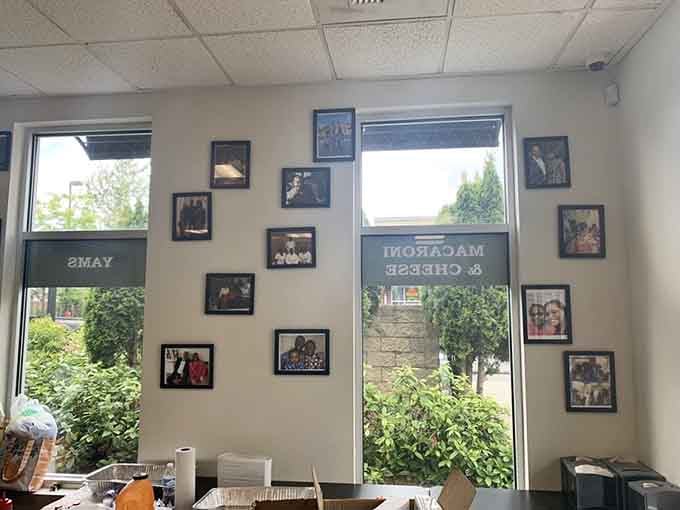 Family photos covering the wall, a quiet reminder that this place was built on something real and personal.