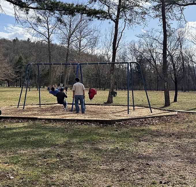 The playground keeps kids entertained between tower viewings, because even geological wonders need activity breaks for little ones.