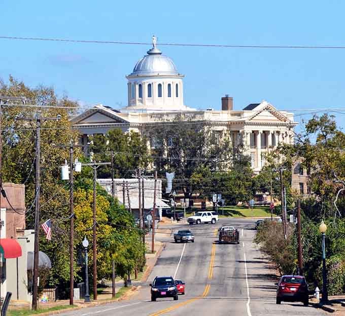 Anderson County Courthouse's dome dominates the skyline, proving government buildings once had actual architectural ambition.