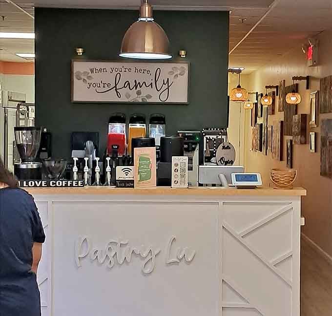 The counter where magic happens, complete with a sign reminding you that coffee makes everything taste better.