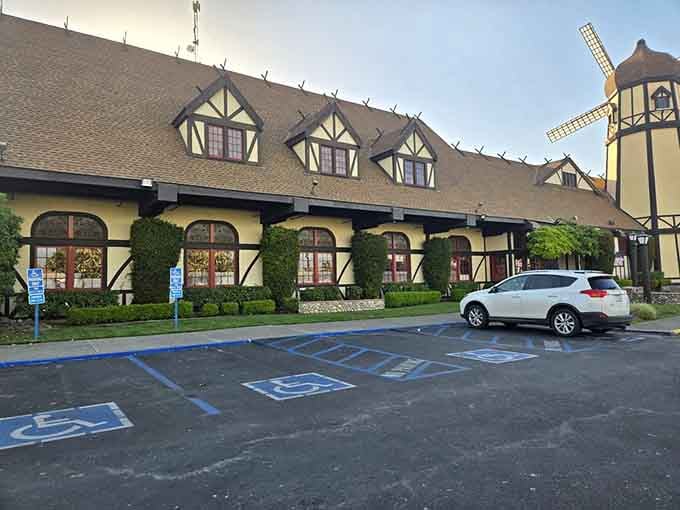 That half-timbered facade and slowly turning windmill visible from the parking lot make arriving here feel genuinely cinematic.