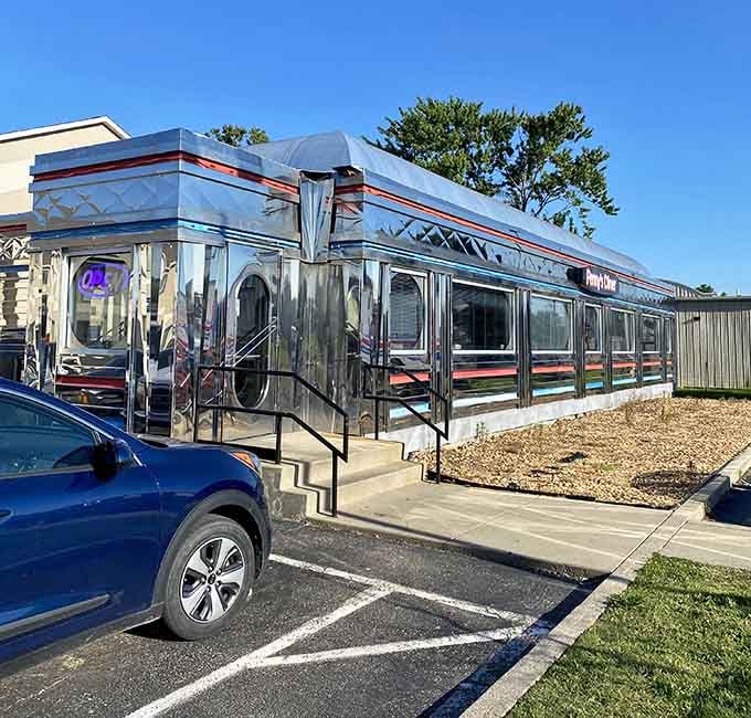 Chrome gleaming under blue skies, Penny's Diner stands proud and polished in Dexter, Missouri.