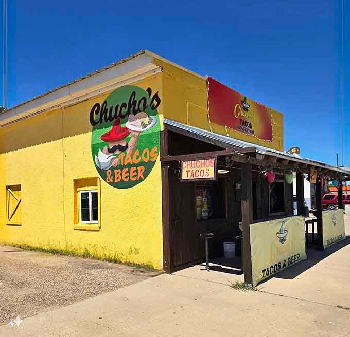 Chucho's Tacos and Beer announces itself with a hand-painted mural and sunshine-yellow walls that practically radiate flavor before you've even stepped through the door.