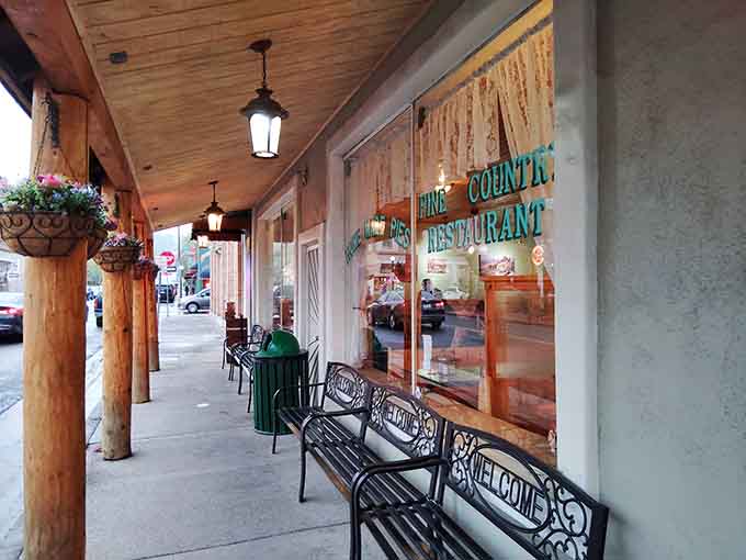 "Welcome" benches out front, because Pine Country Restaurant means that word in the most delicious way possible.