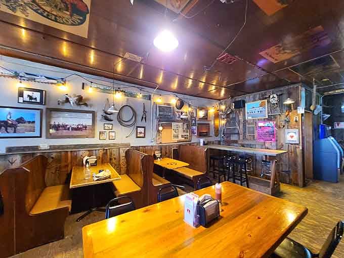 Cozy wooden booths, warm string lights, and walls full of Western history, this room has stories it hasn't even told yet.
