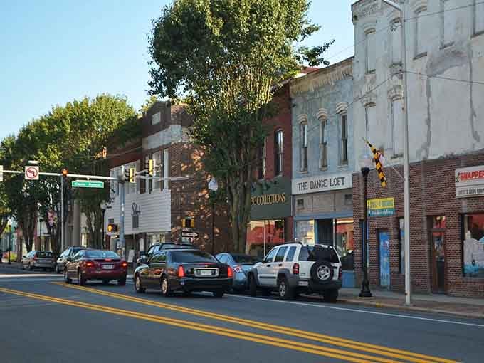 Golden evening light washes over Market Street's brick storefronts, making even a Tuesday evening feel like something worth remembering.