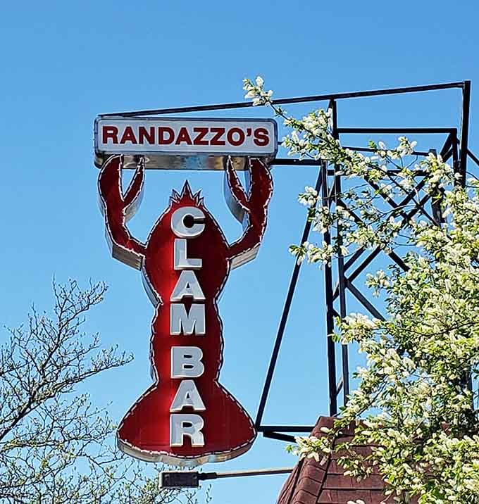 That red lobster sign reaching toward a blue spring sky is the most cheerful landmark in all of Sheepshead Bay.